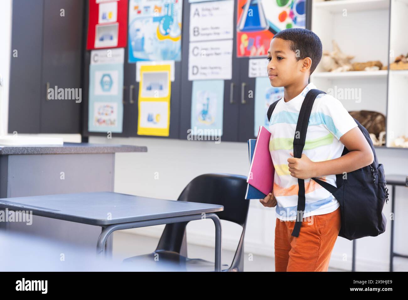 Biracial boy ready for school, with copy space Stock Photo - Alamy
