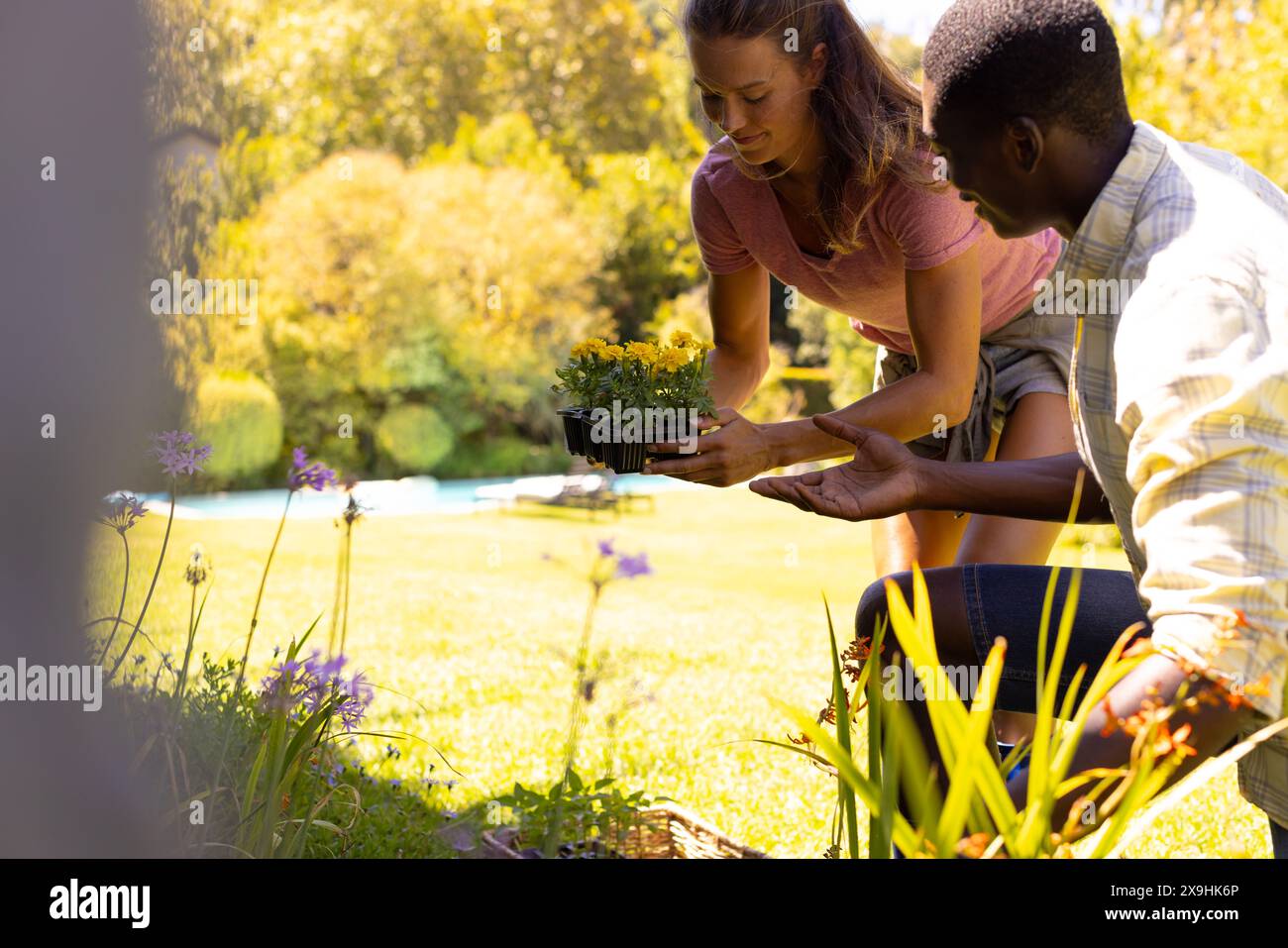 Wearing yellow flowers hi-res stock photography and images - Alamy