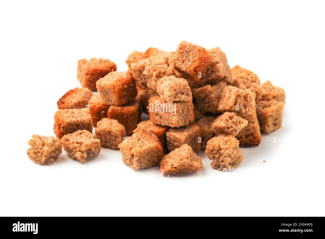 Salted rye bread crackers in bulk on a white background Stock Photo - Alamy