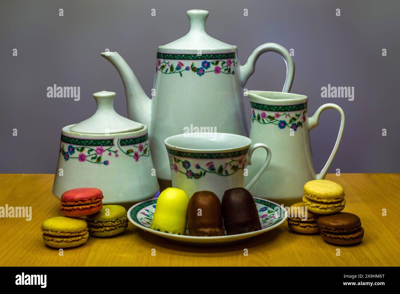 a tea set and some sweets Stock Photo - Alamy