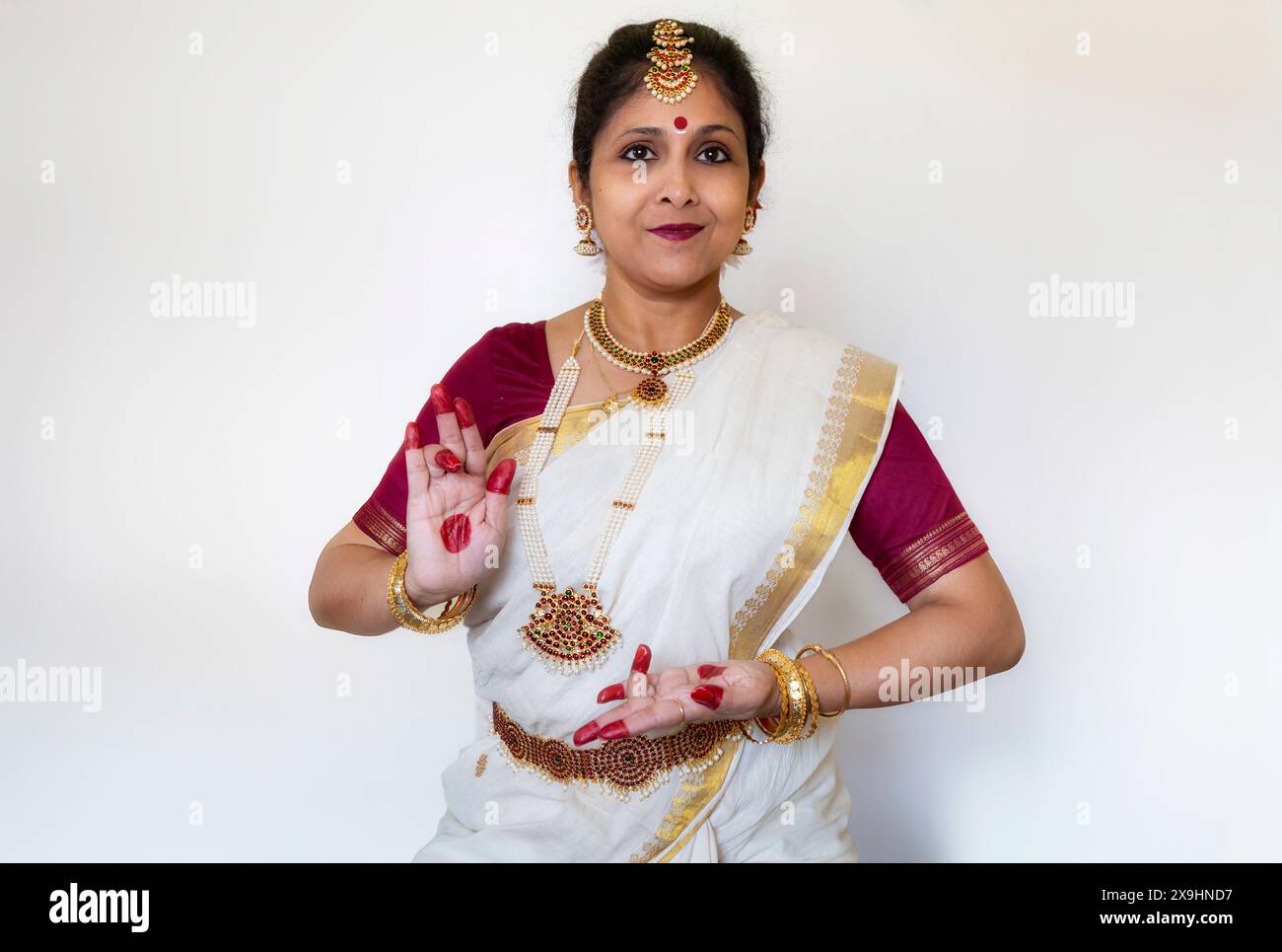 Female Indian classical dancer demonstrating Bharatanatyam classical ...