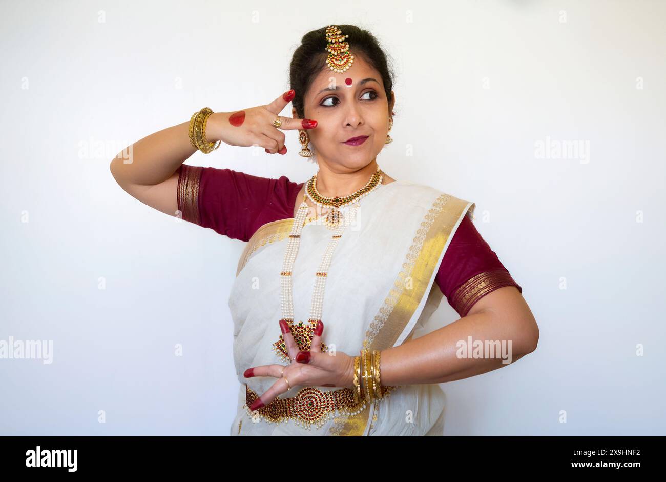 Female Indian classical dancer demonstrating Bharatanatyam classical ...