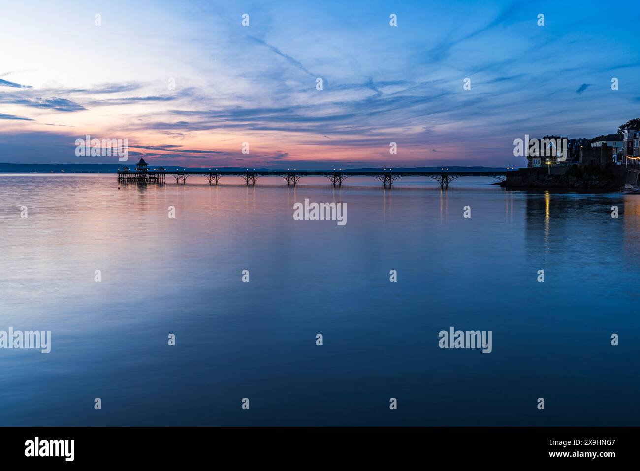 Clear and warm evening down on Clevedon beach with calm seas Stock ...