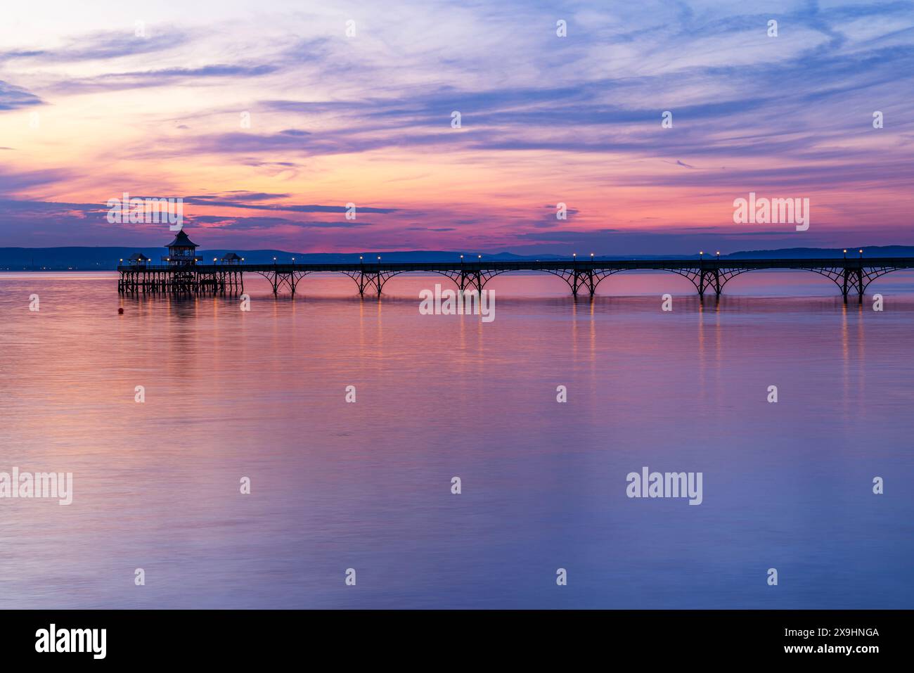 Clear and warm evening down on Clevedon beach with calm seas Stock ...