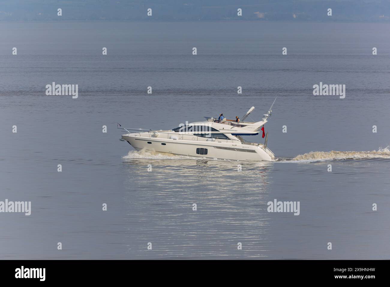 A small pleasure craft out for a cruise Stock Photo - Alamy