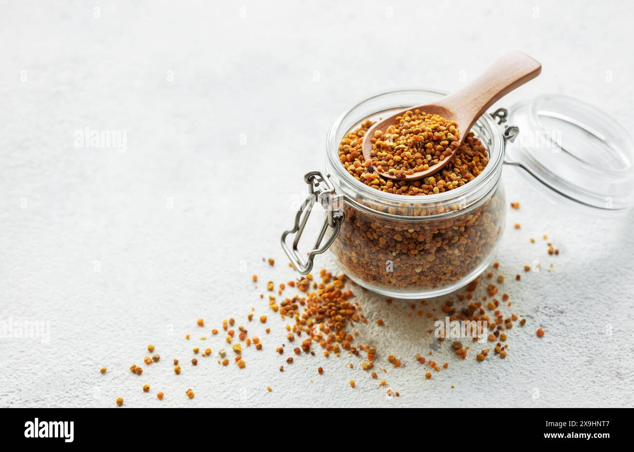 Healthy bee pollen grains. Bee pollen on a glass jar Stock Photo - Alamy