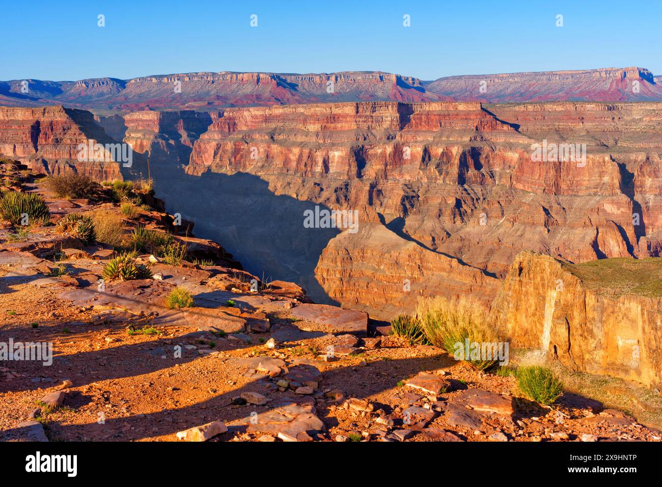 Sunset over the Grand Canyon, with the geological strata being clearly ...