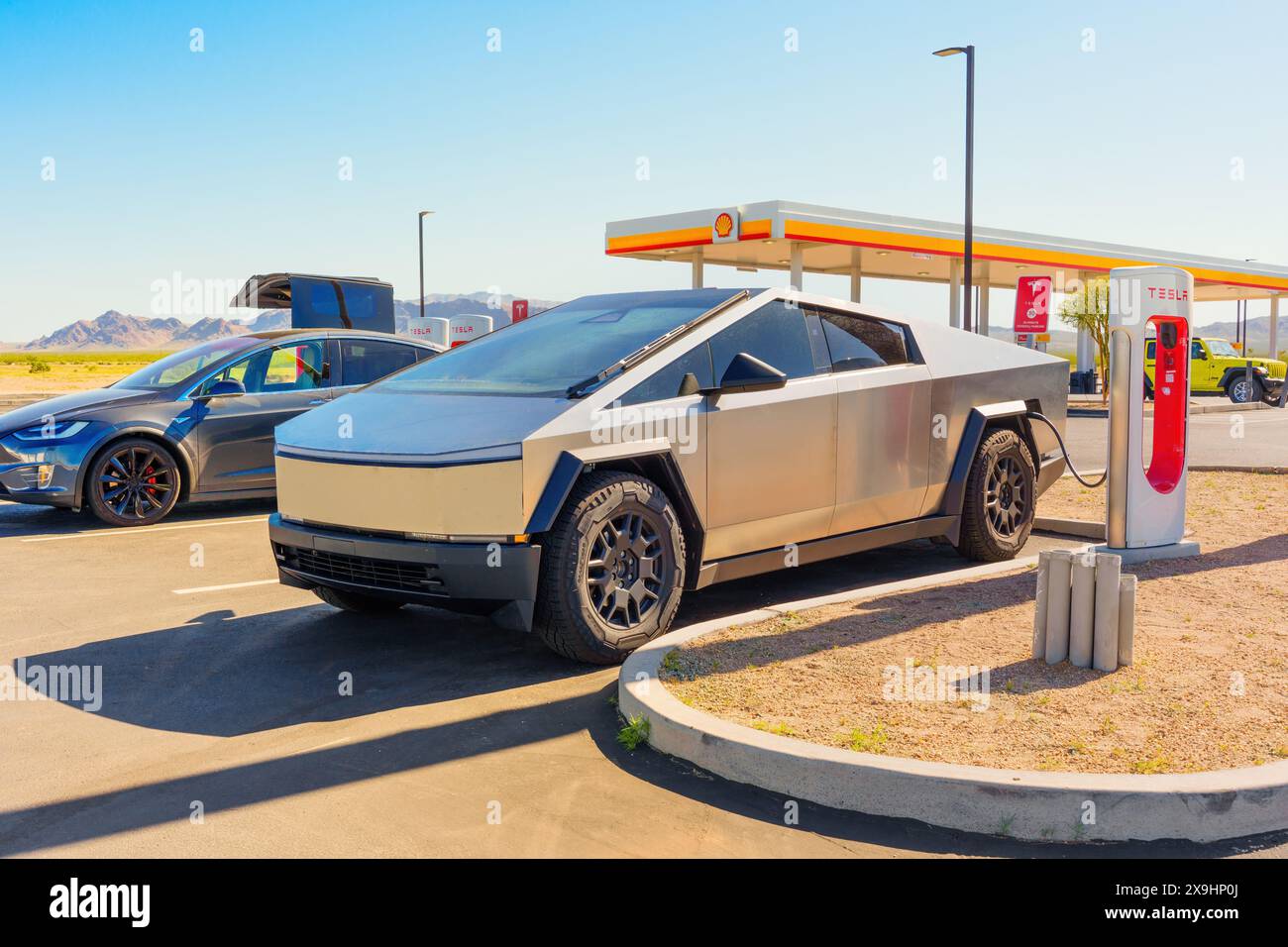 White Hills, Arizona - April 14, 2024: Tesla Vehicles Replenish Energy ...