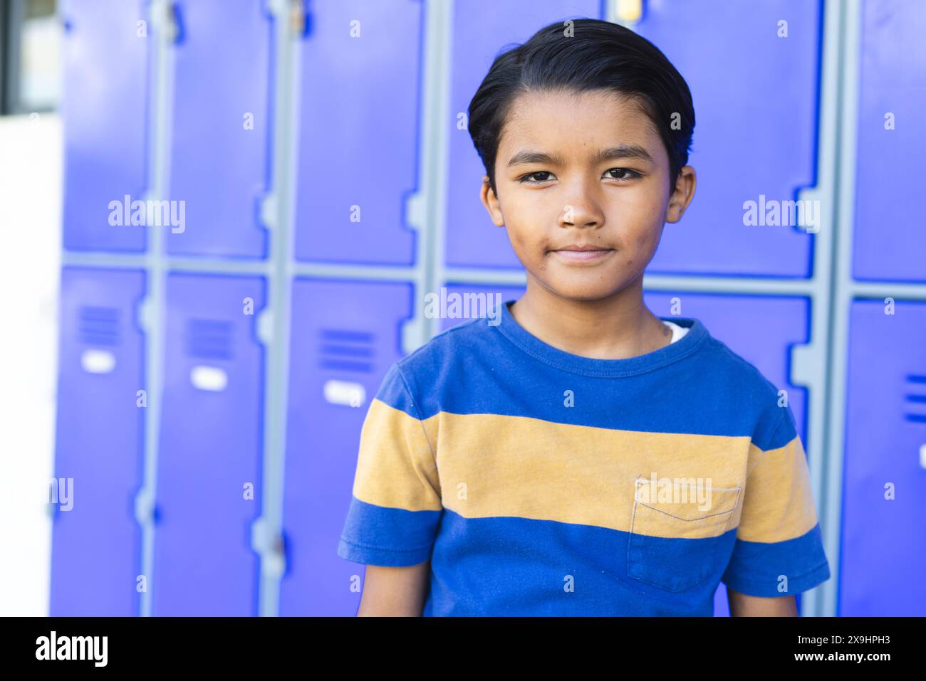 Boy wearing green shirt hi-res stock photography and images - Alamy