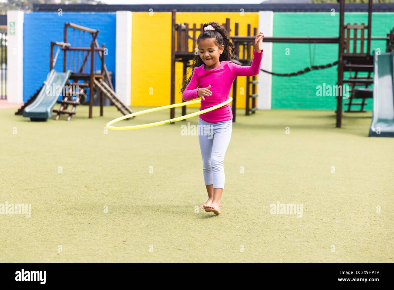 Happy kid hula hoop african american hi-res stock photography and ...