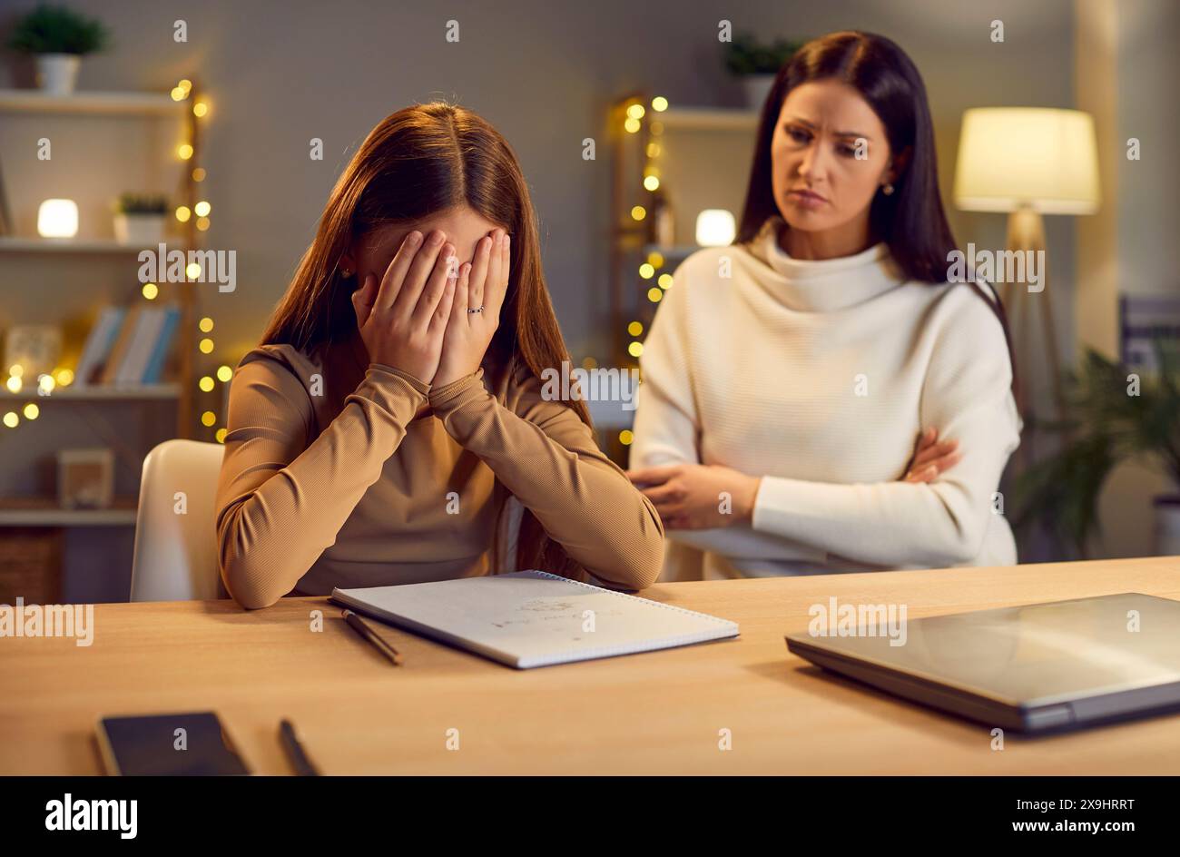 Mother Supporting Daughter With Homework Stock Photo - Alamy