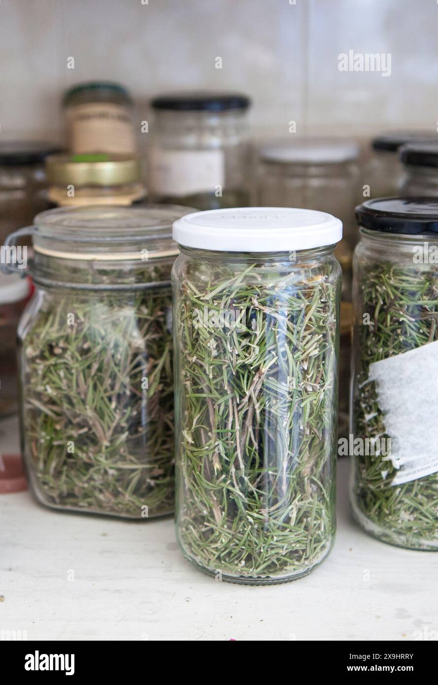 Cupboard full of glass jars with natural home remedies. Closseup Stock ...
