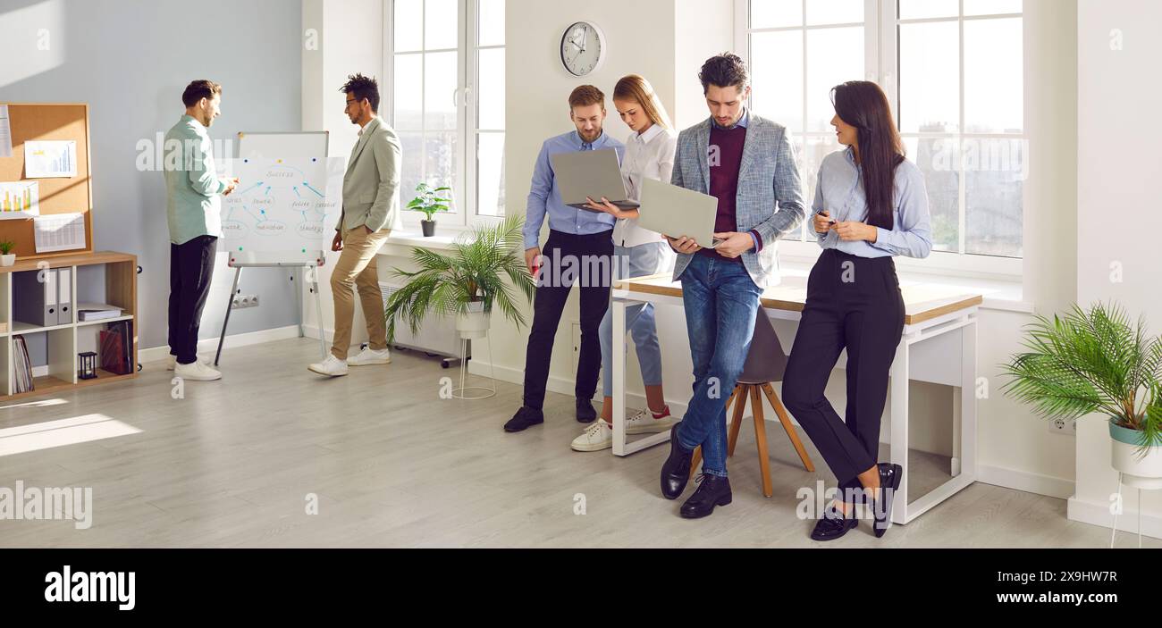 Group of business people chatting after meeting. Company employees ...