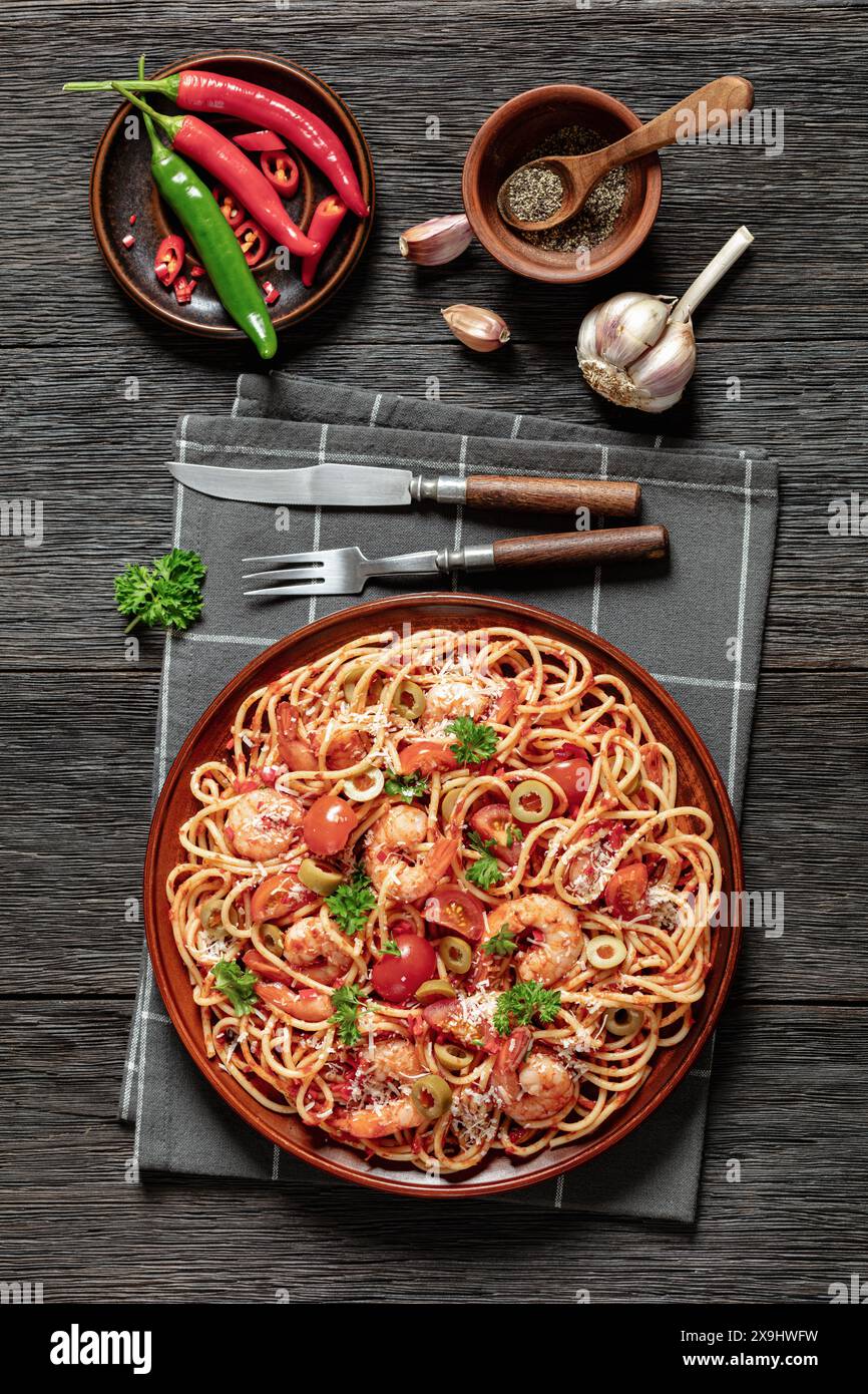 shrimp fra diavolo with spaghetti, tomato based hot sauce sprinkled ...