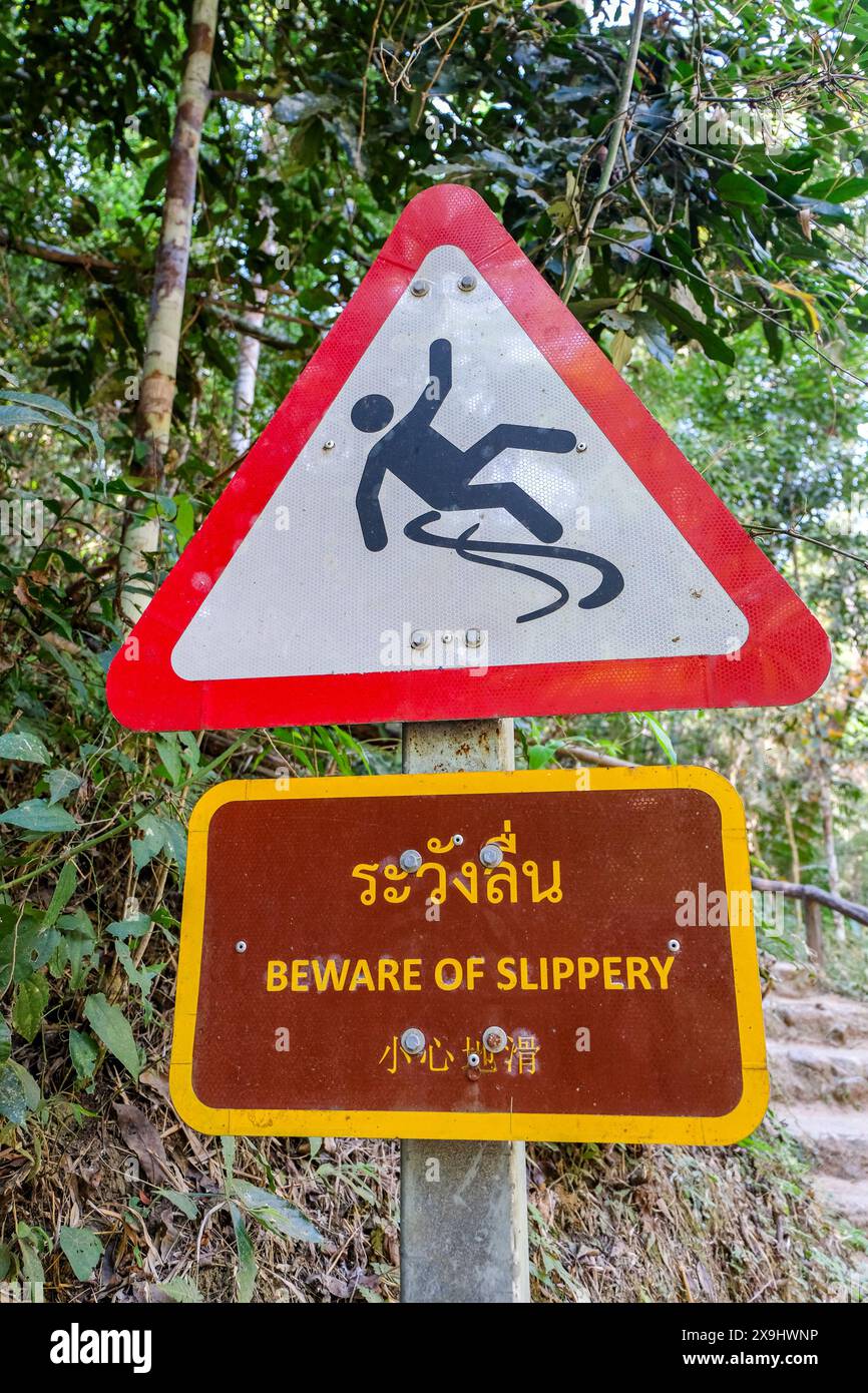 Warning sign at Mok Fa Falls Stock Photo - Alamy
