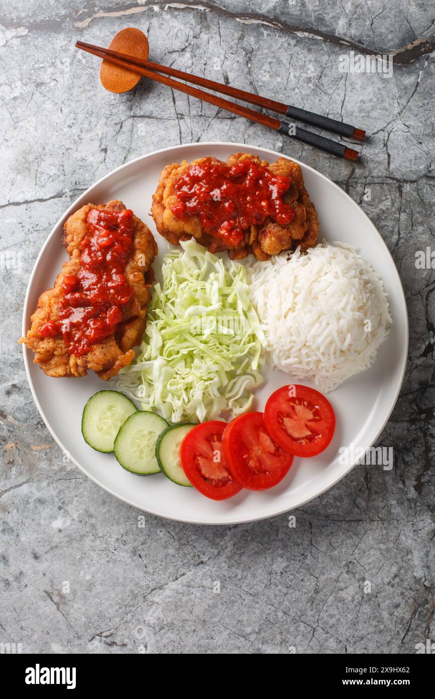 Ayam geprek an Indonesian fried chicken with sambal sauce served with ...