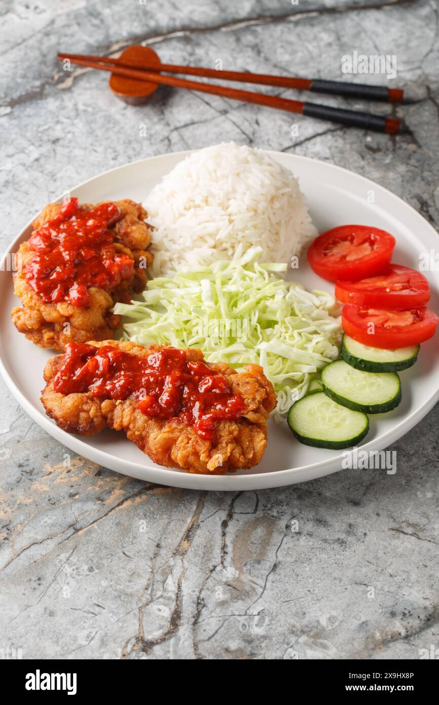 Ayam geprek an Indonesian fried chicken with sambal sauce served with ...