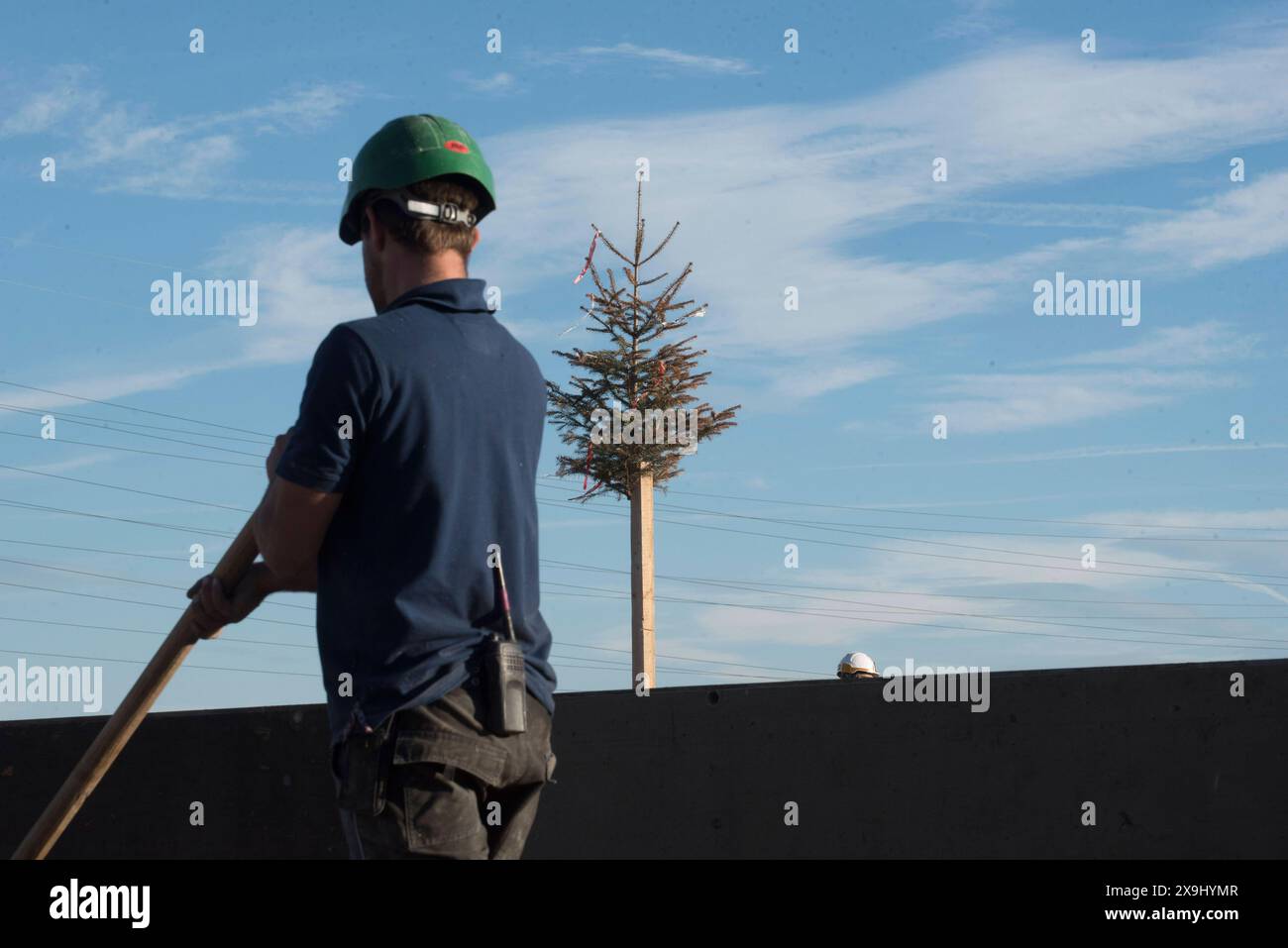 construction worker at a building site, employee in construction ...