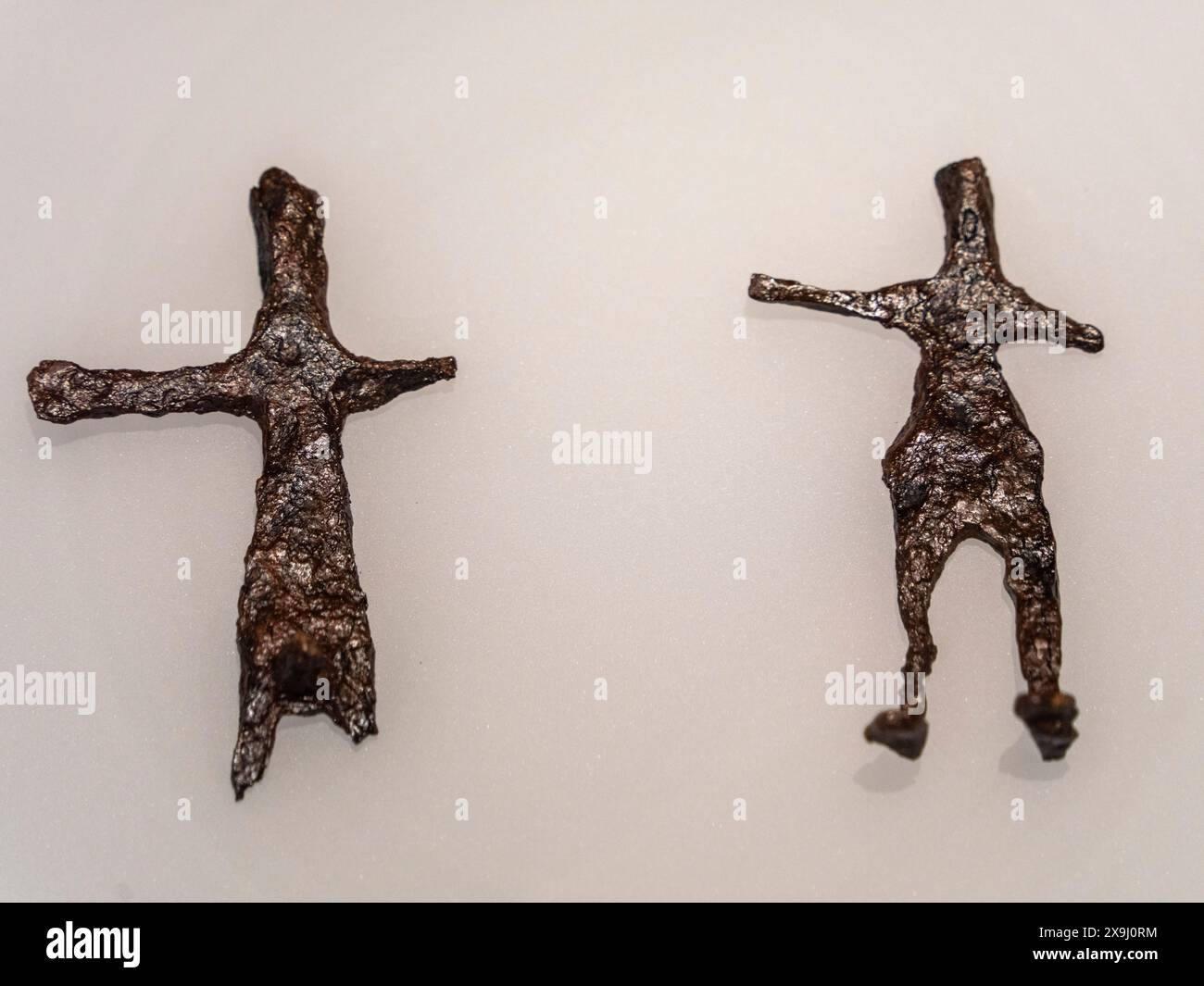 iron votive offerings representing a man and a woman, sanctuary of the ...