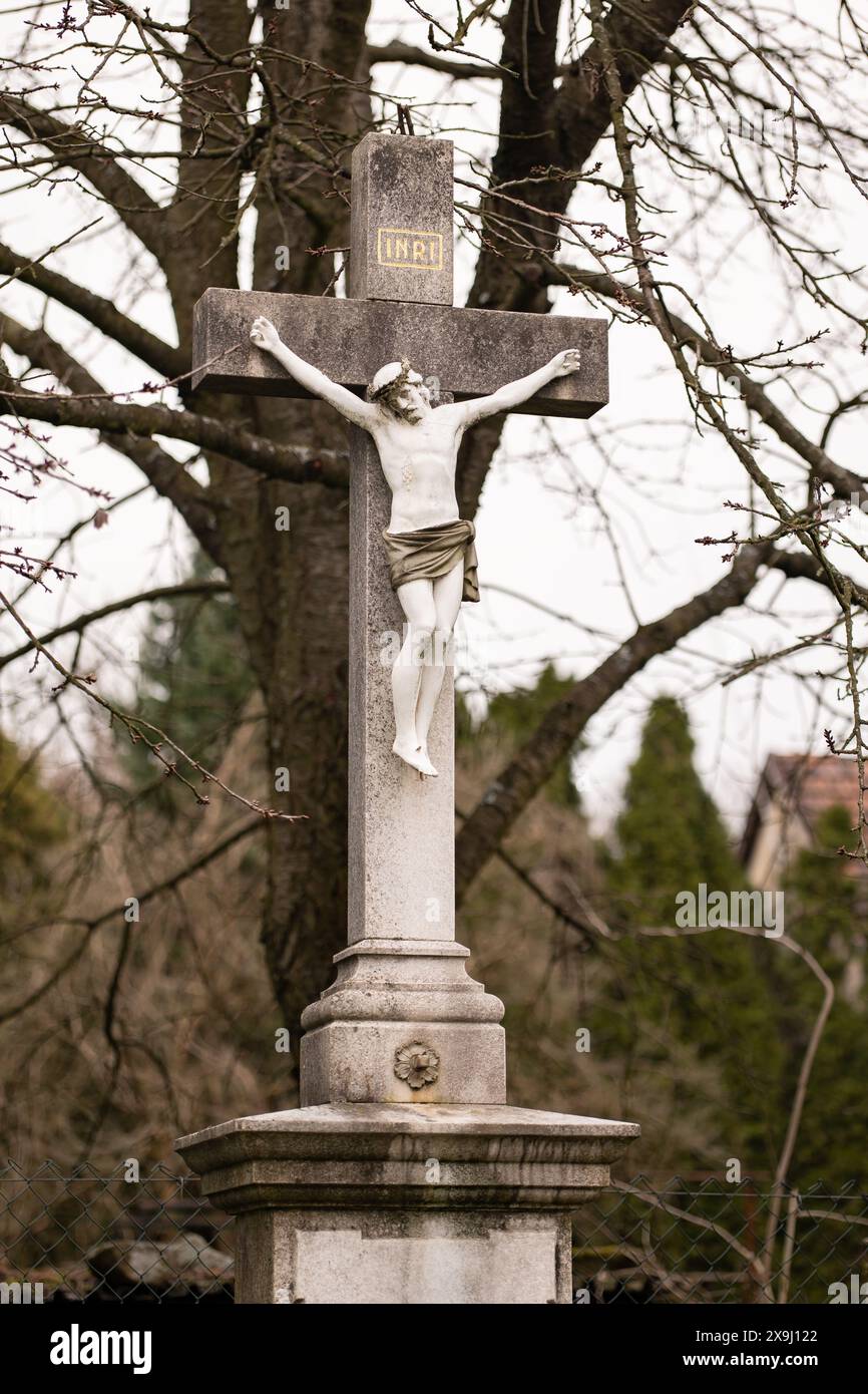 Stone statue of Jesus Christ with INRI text, vertical image Stock Photo ...