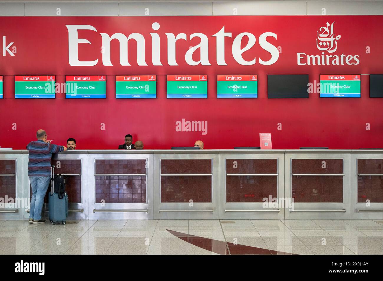 An Emirates Airline information desk is seen at Dubai International ...