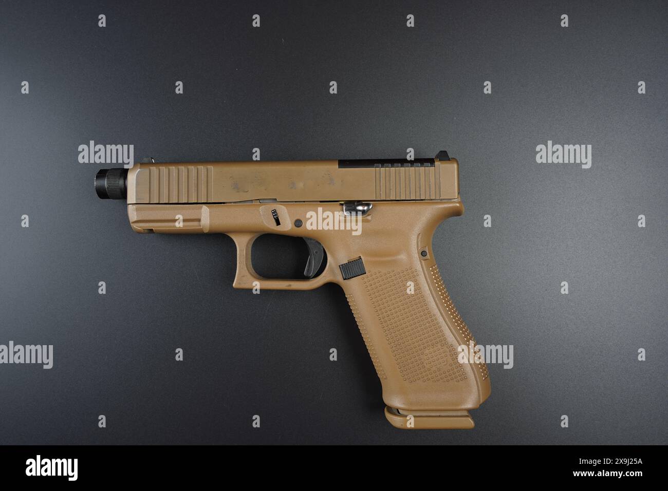 Glock 19X 9MM Semi-Auto pistol Threaded Barrel Suppressor Stock Photo ...