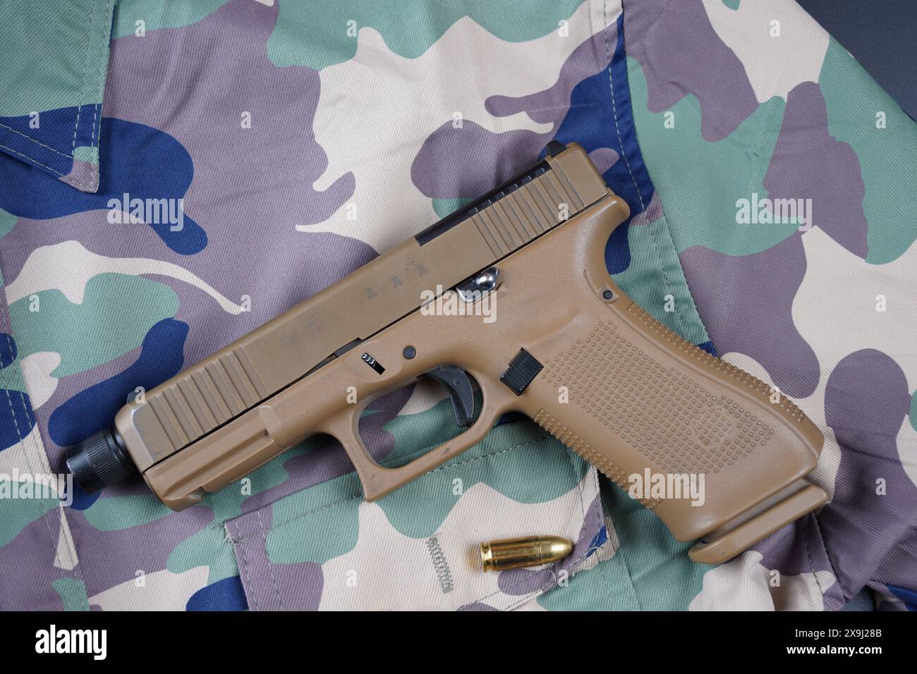 Glock 19X 9MM Semi-Auto pistol Threaded Barrel Suppressor Stock Photo ...