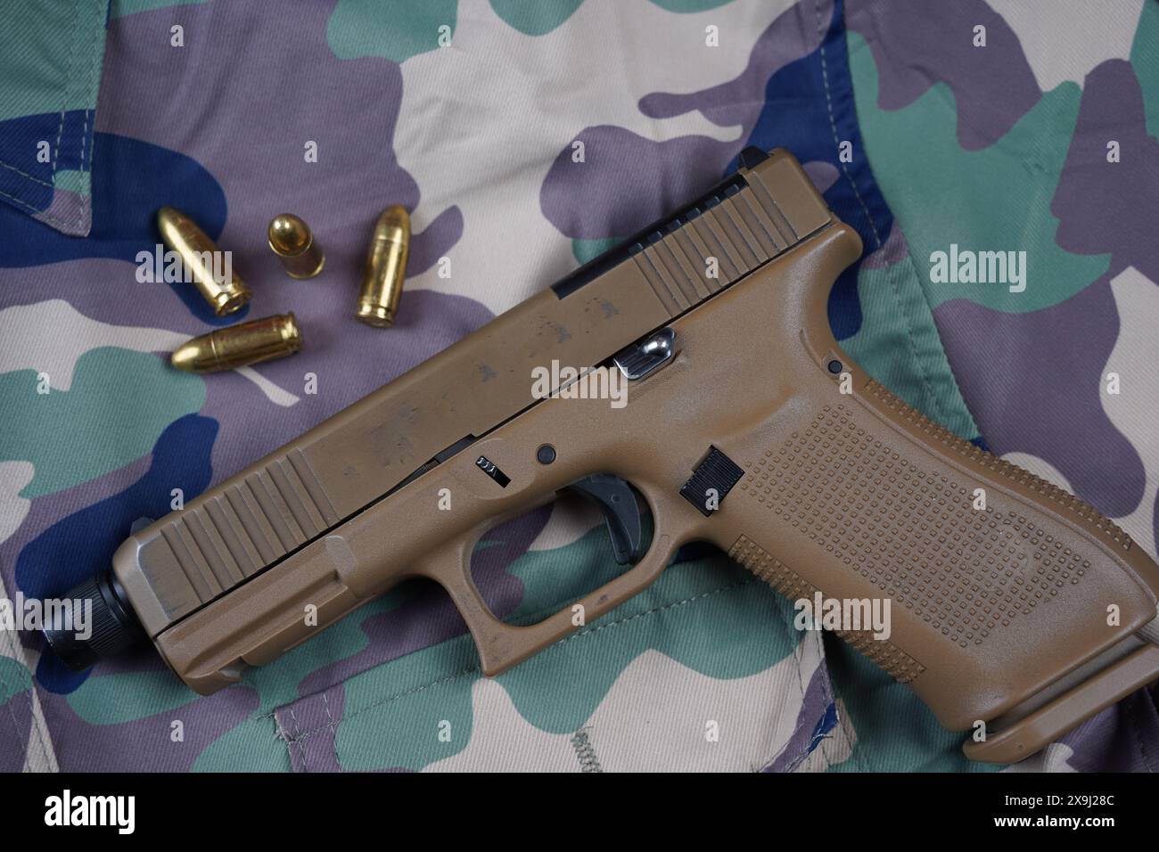 Glock 19X 9MM Semi-Auto pistol Threaded Barrel Suppressor Stock Photo ...