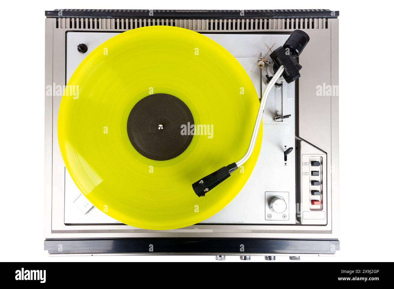 Vintage turntable record player with yellow vinyl isolated on white ...