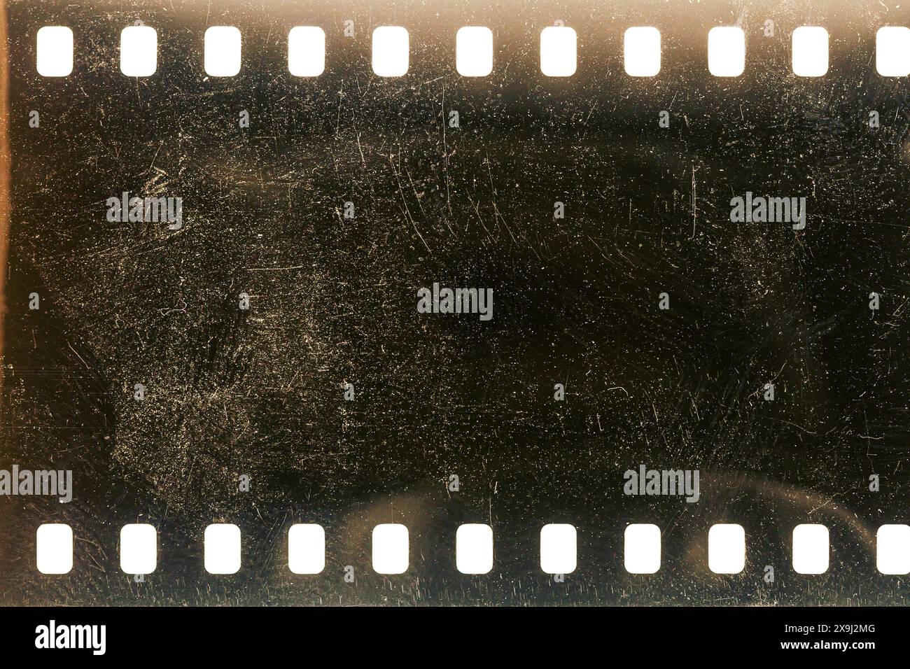 Dusty and grungy 35mm film texture or surface. Perforated scratched ...