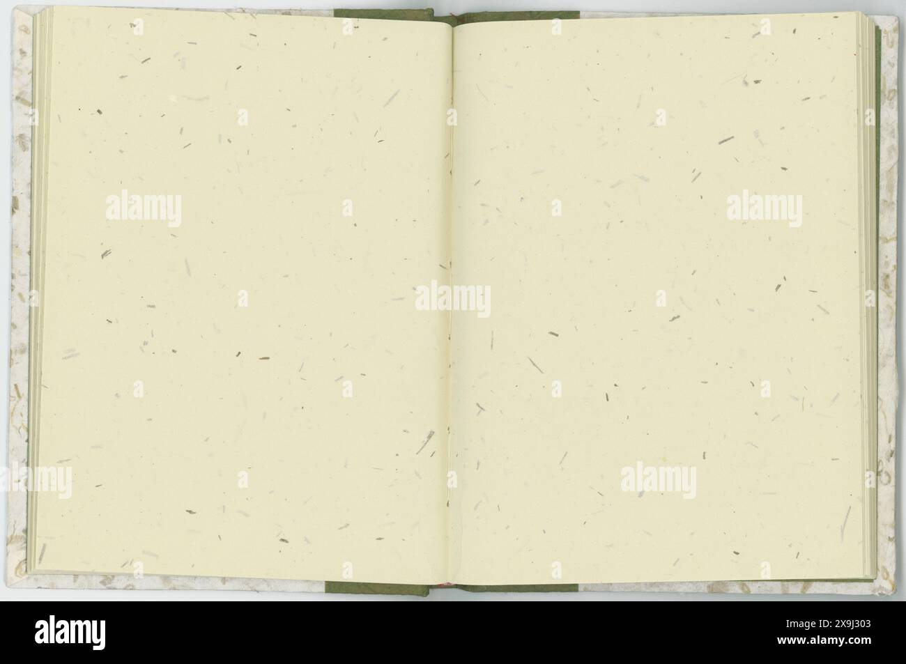 Empty handmade paper for writing or drawing in an open book Stock Photo ...
