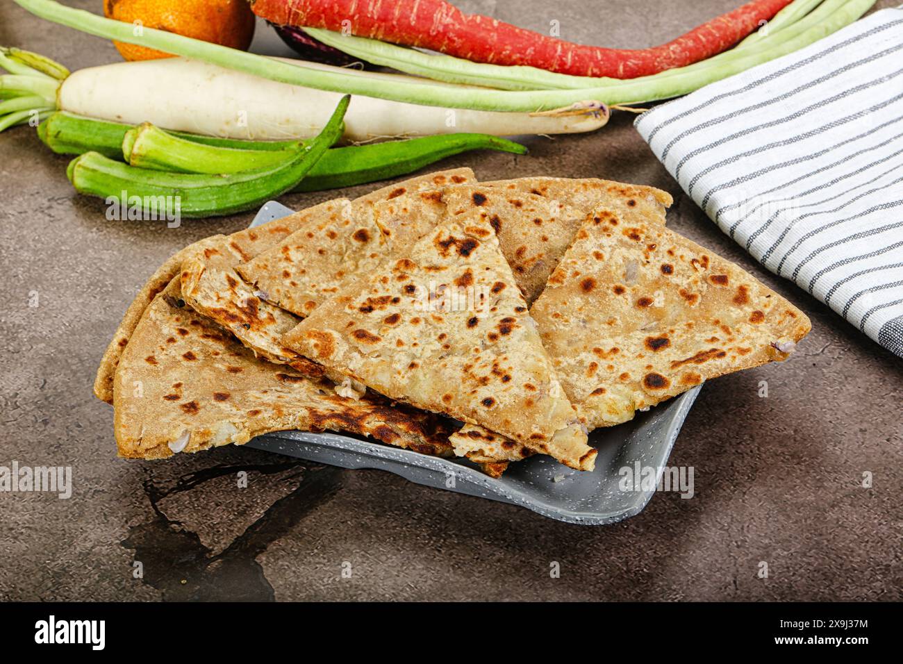 Indian vegetarian Aloo Paratha - bread with potato Stock Photo - Alamy