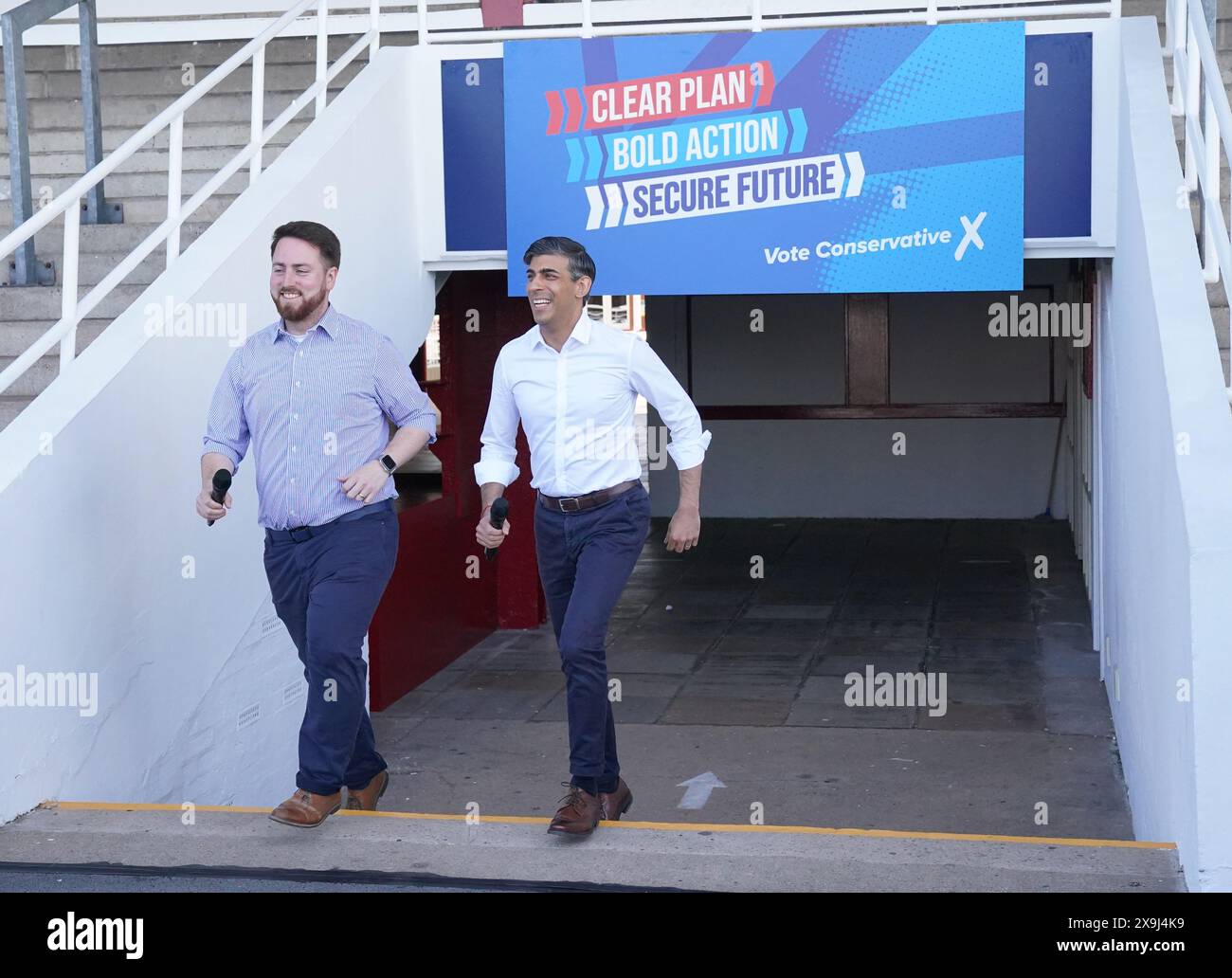 Prime Minister Rishi Sunak (right) and Conservative candidate for ...