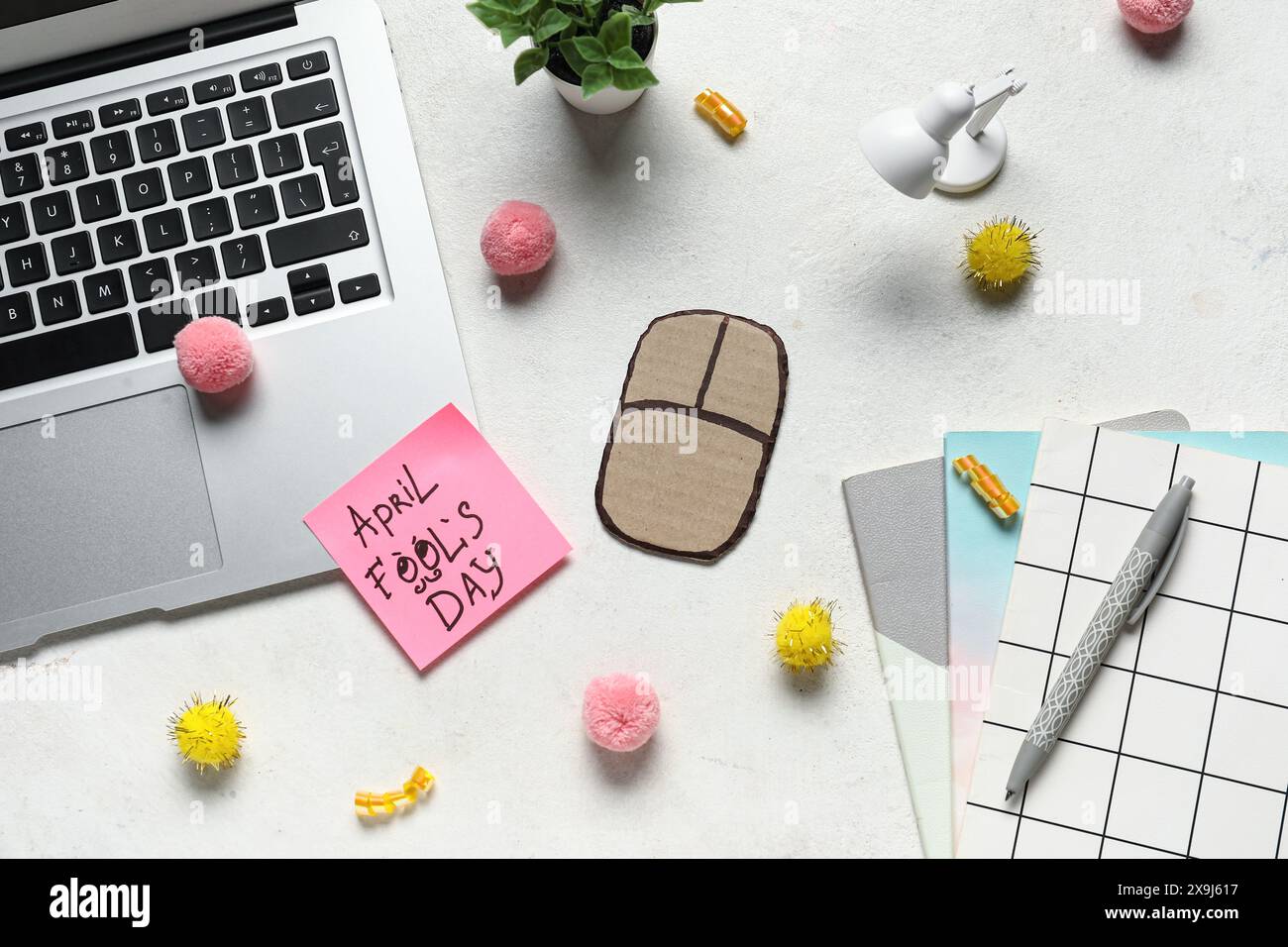 Carton mouse, pen and sticky note on white background. April Fools Day ...