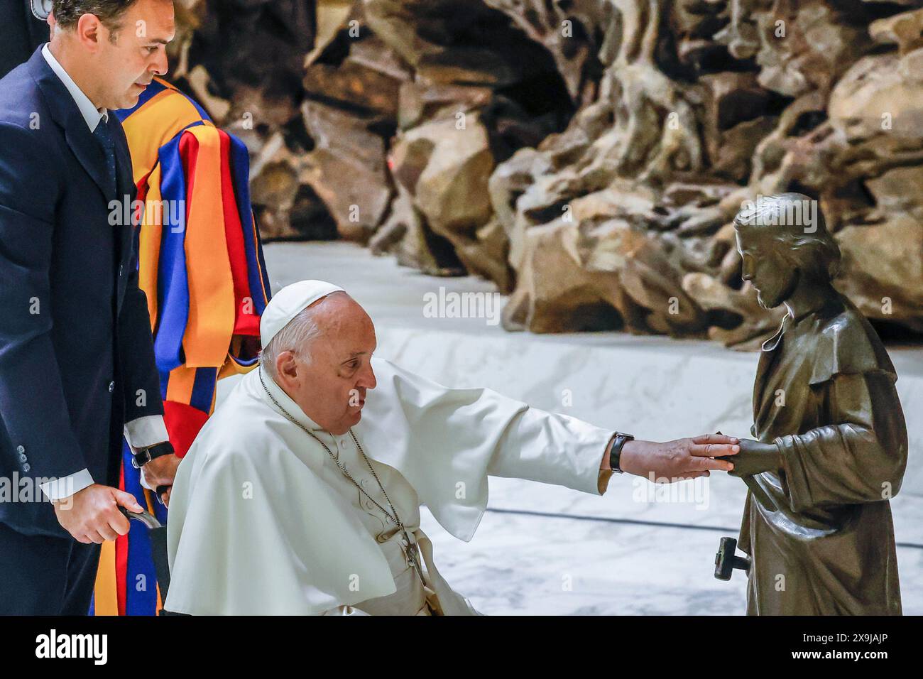 Vatican City, Vatican, 1 June, 2024. Pope Francis touches a statue of ...