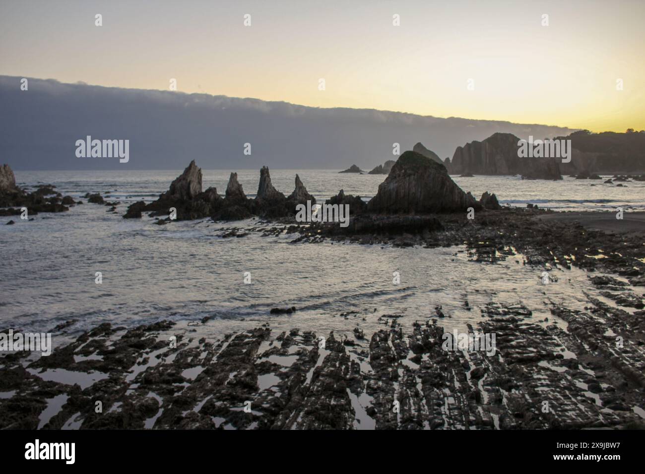 Gueirua beach in Asturias, Spain, at dawn in a spring day Stock Photo ...