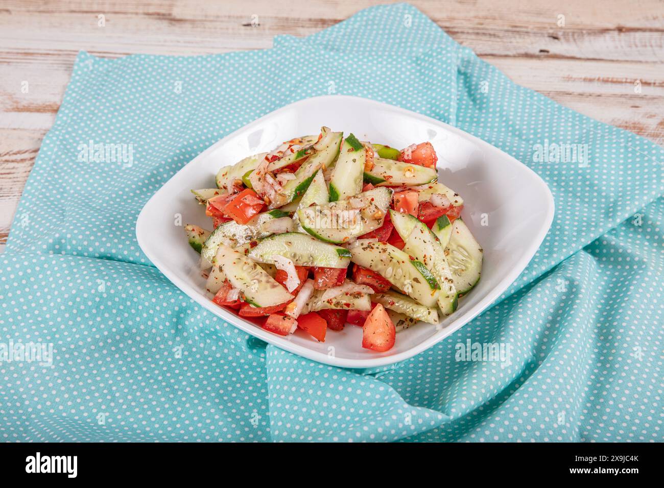 Turkish Coban (choban) salata or Shepherds salad in white bowl. Turkish ...