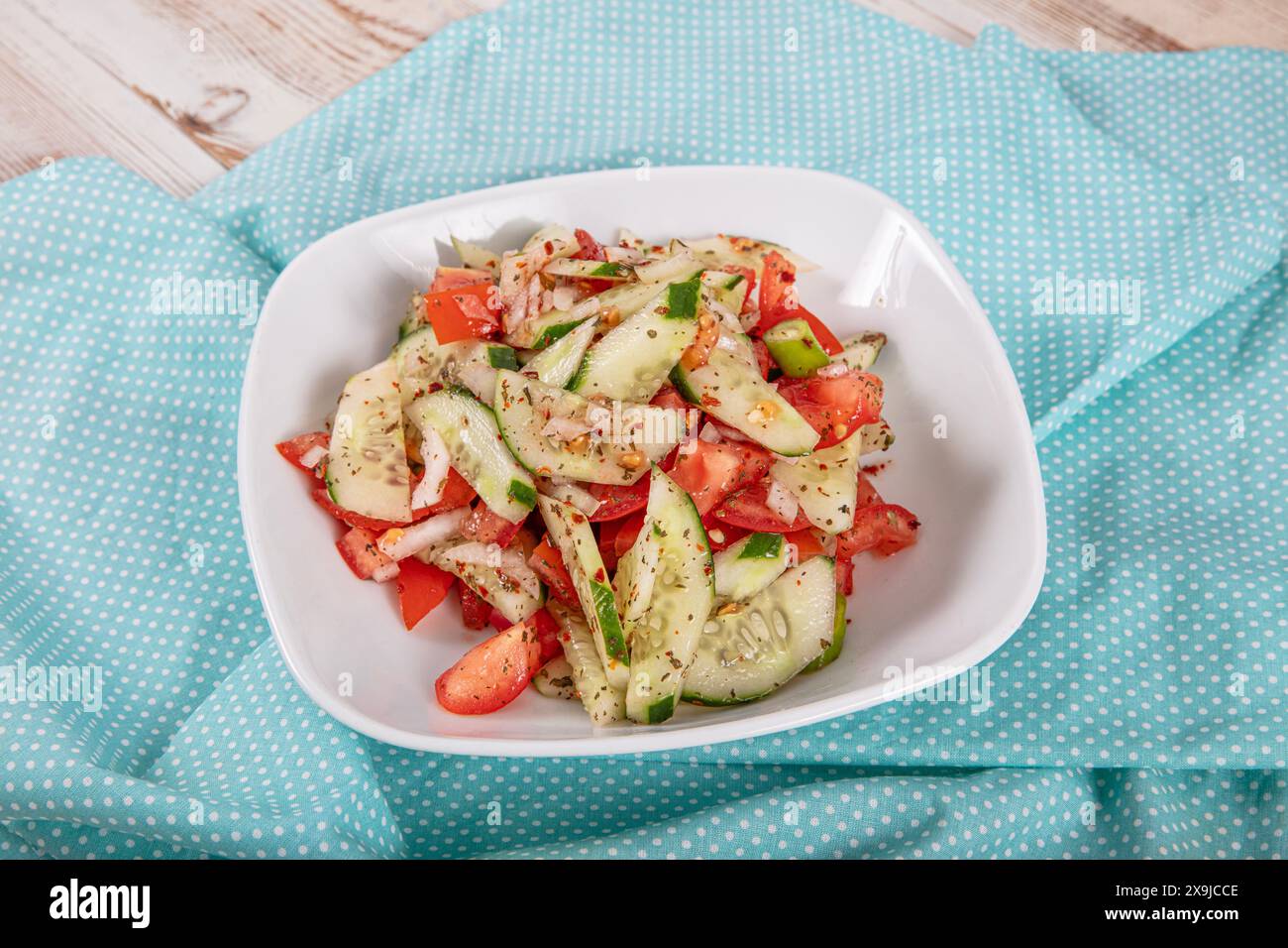 Turkish Coban (choban) salata or Shepherds salad in white bowl. Turkish ...