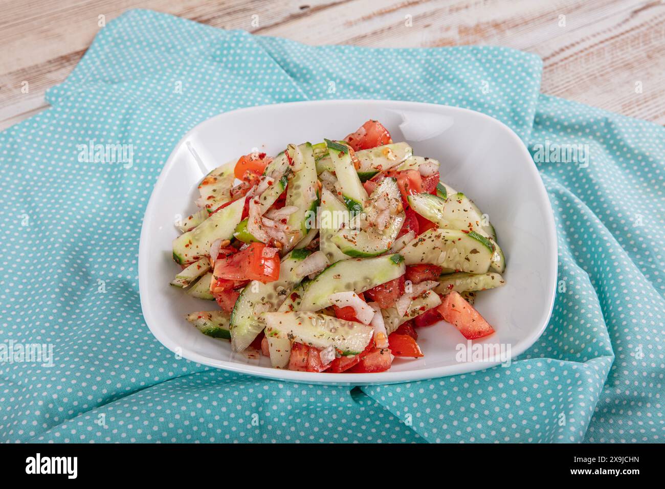Turkish Coban (choban) salata or Shepherds salad in white bowl. Turkish ...