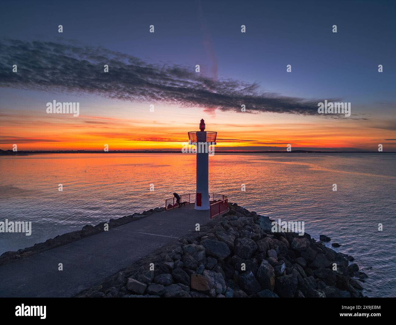 April sunset at Howth Harbour Stock Photo - Alamy