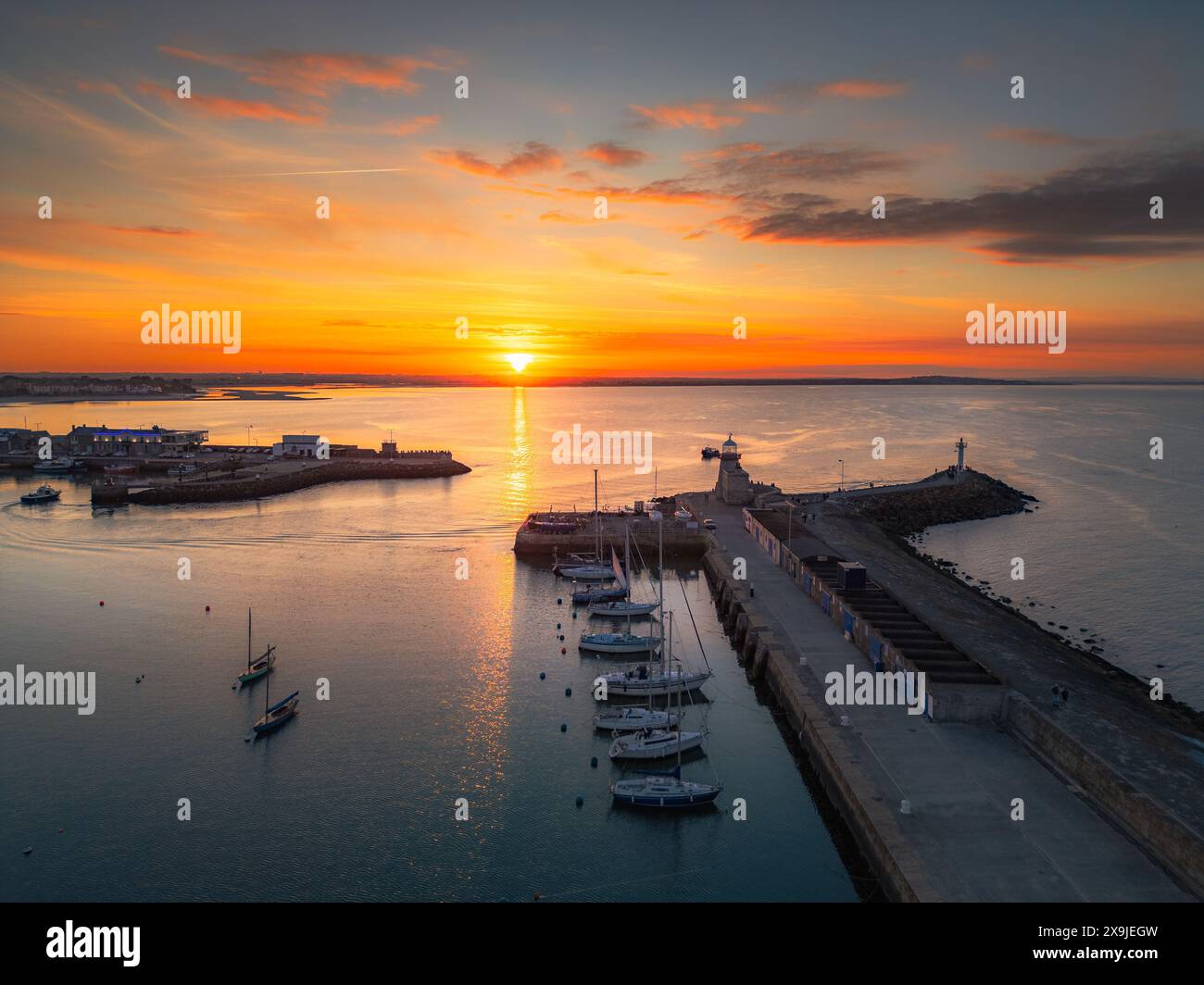 April sunset at Howth Harbour Stock Photo - Alamy