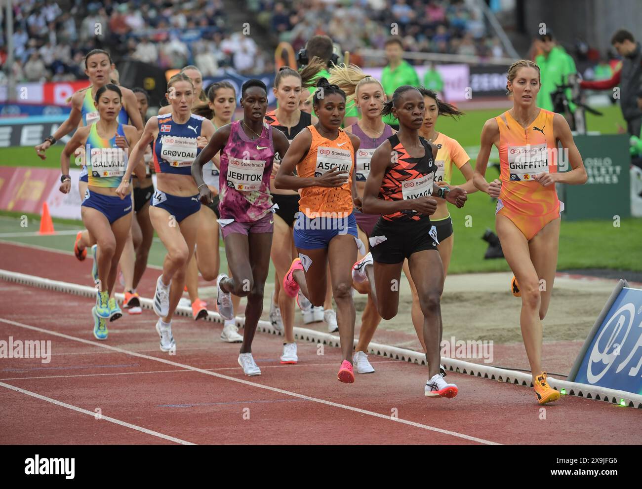 Caroline Nyaga of Kenya and Georgia Griffith of Australia competing in ...