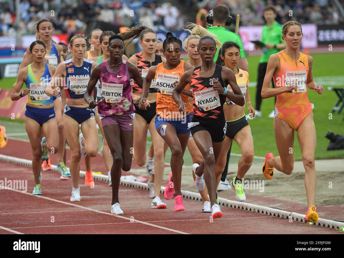 Caroline Nyaga of Kenya and Georgia Griffith of Australia competing in ...