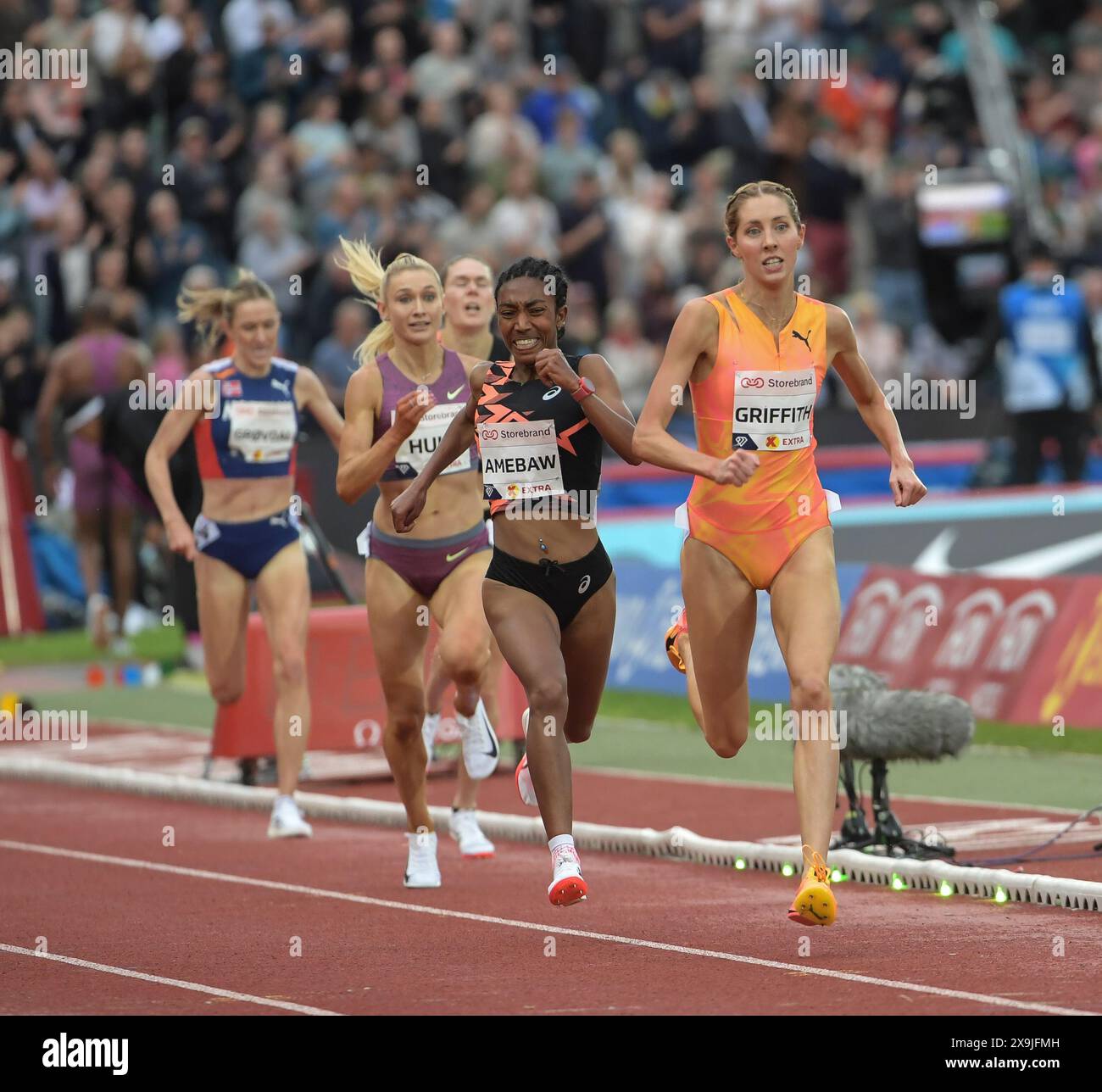 Likina Amebaw of Ethiopia and Georgia Griffith of Australia competing ...