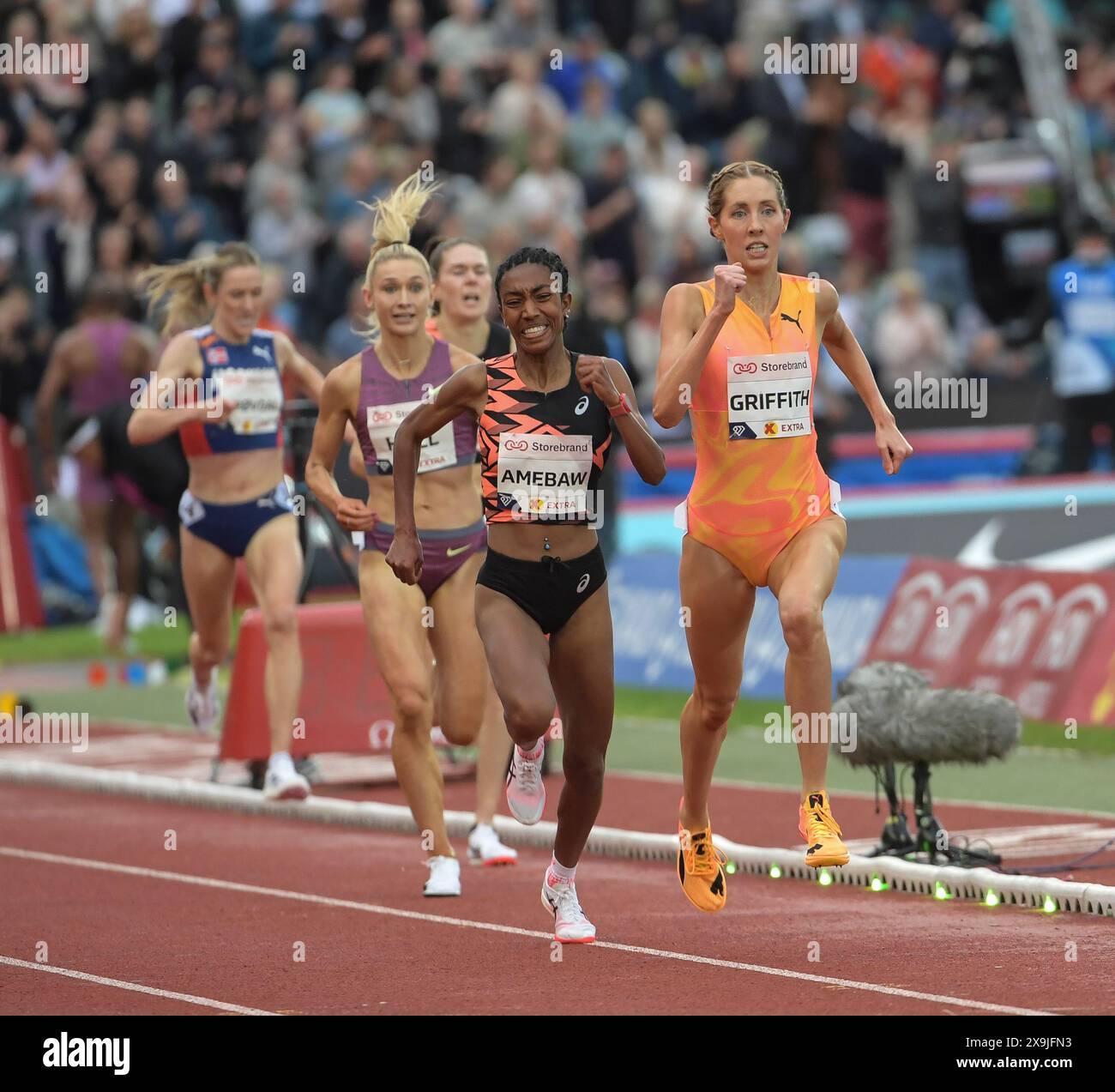 Likina Amebaw of Ethiopia and Georgia Griffith of Australia competing ...