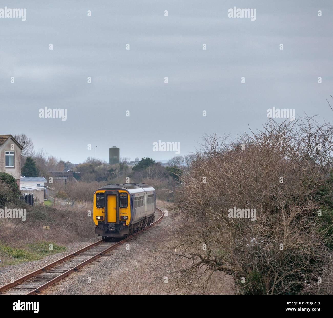 Northern Rail class 156 diesel train on the single track Heysham branch ...