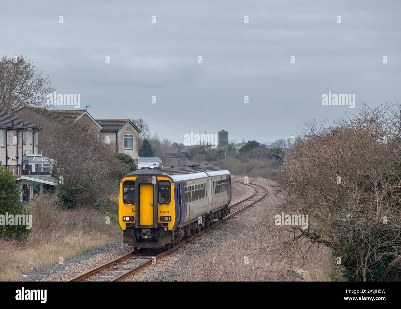 Northern Rail class 156 diesel train on the single track Heysham branch ...