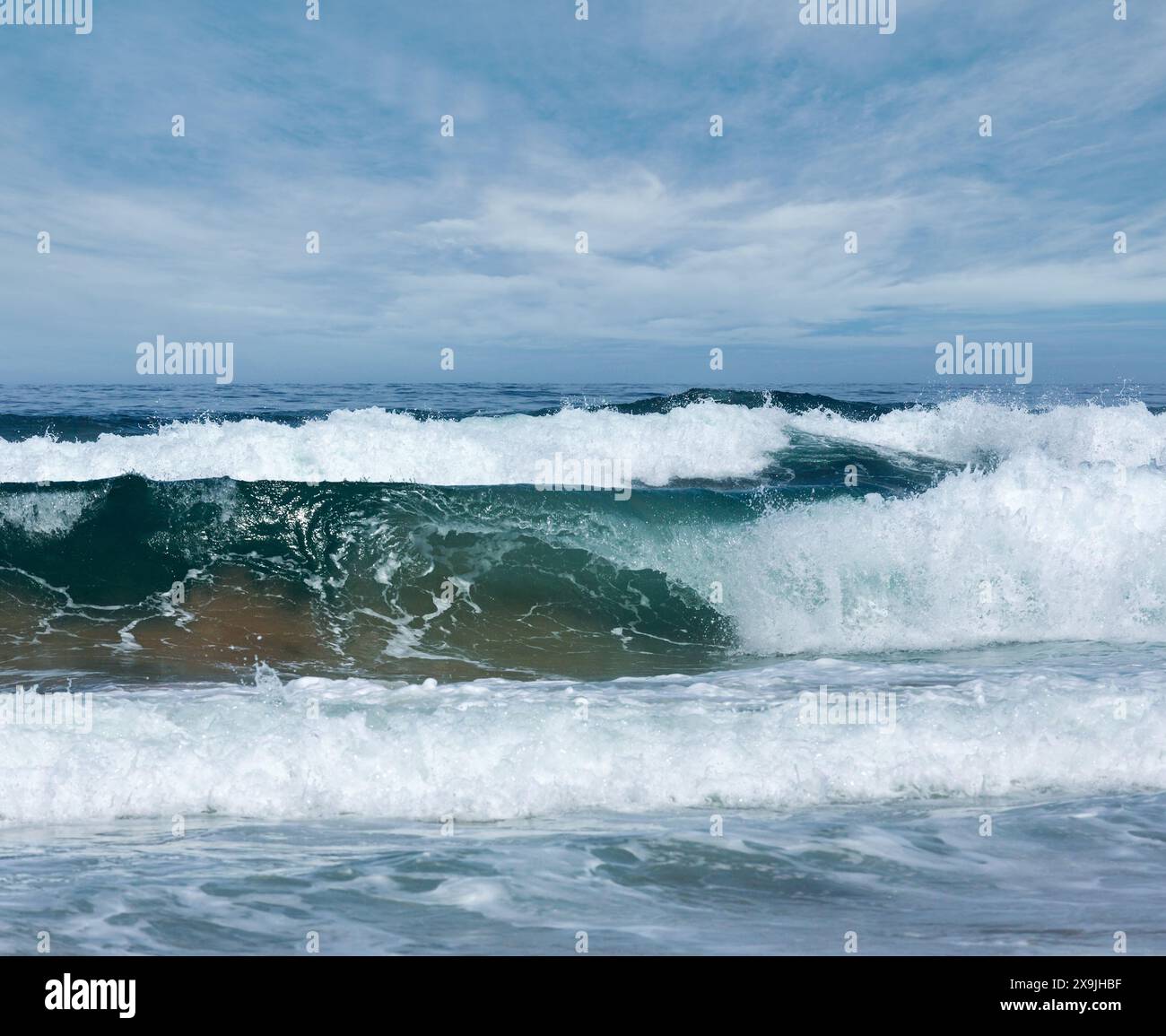 Ocean storm waves with foam and splashes. View from beach Stock Photo ...
