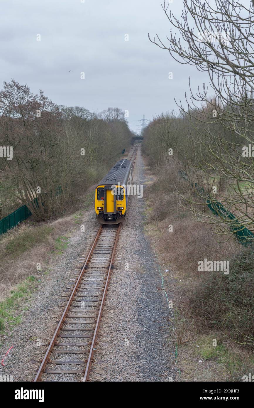 Northern Rail class 156 diesel train on the single track Heysham branch ...