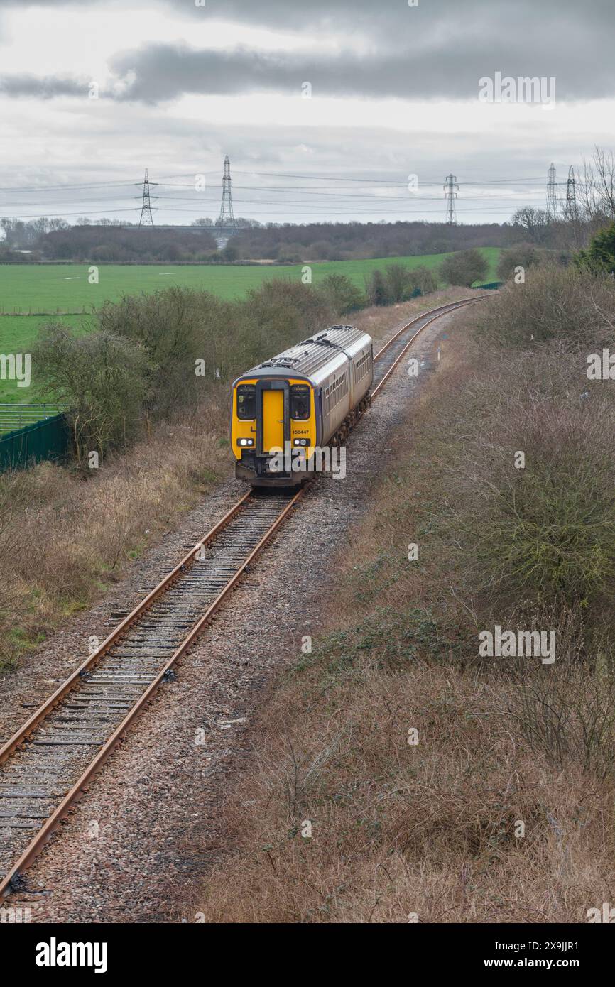 Northern Rail class 156 diesel train on the single track Heysham branch ...